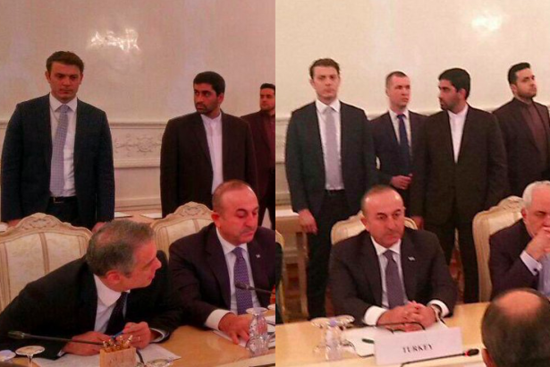 Iranian security guard keeps an eye on the Turkish one at todays Russia ...